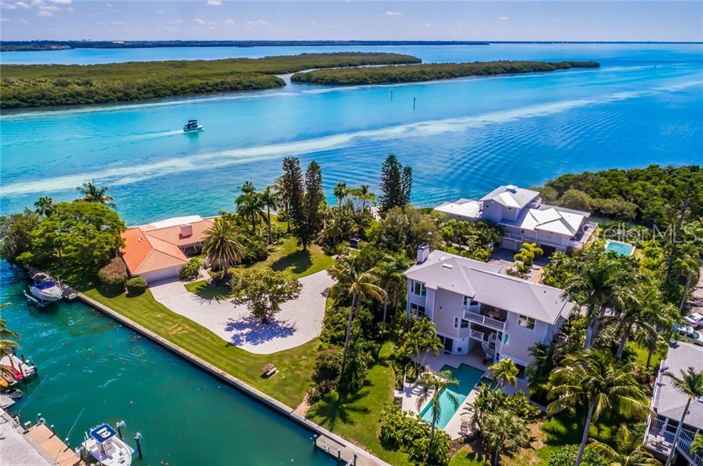 SOLD: Custom Three-Level Canalfront Home on Longboat Key for $1.2M ...